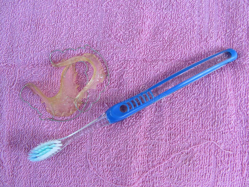 Retainer and toothbrush stock photo. Image of medical - 65752398