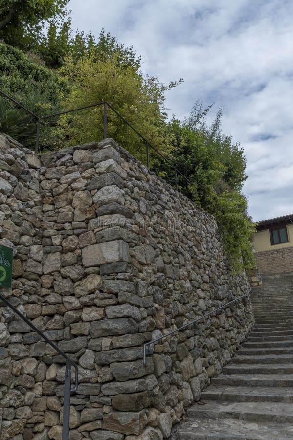 Retaining Wall Formed by Stacked Rocks Stock Image - Image of window ...