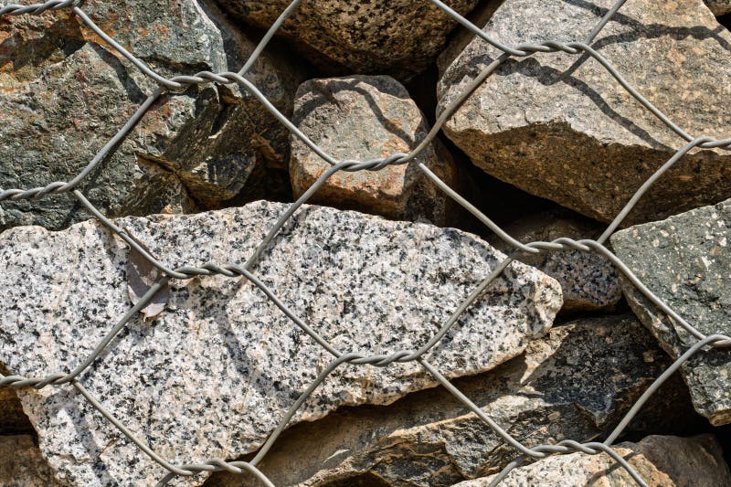Retaining Wall Made of Stones in a Metal Cage. Engineering Solution for ...