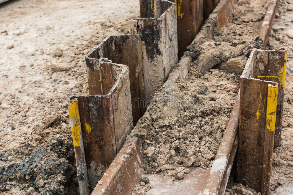 Retaining Wall Steel Sheet Pile Driving Machine Work Photo stock ...