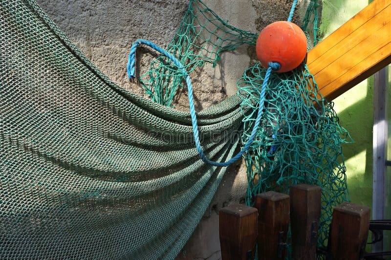 Una Rete Da Pesca Che Appende Sulla Parete Immagine Stock - Immagine di ...