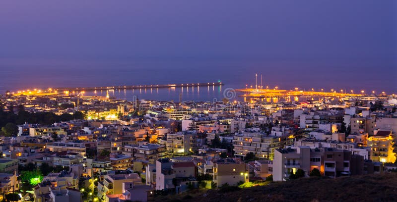 Rethymno harbour at night stock photo. Image of night - 25986328