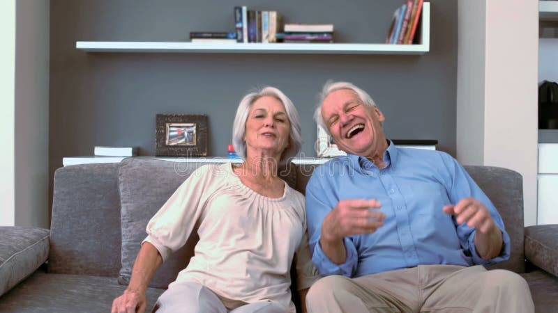 Retired Woman Flopping Down on the Couch Stock Video - Video of filming ...