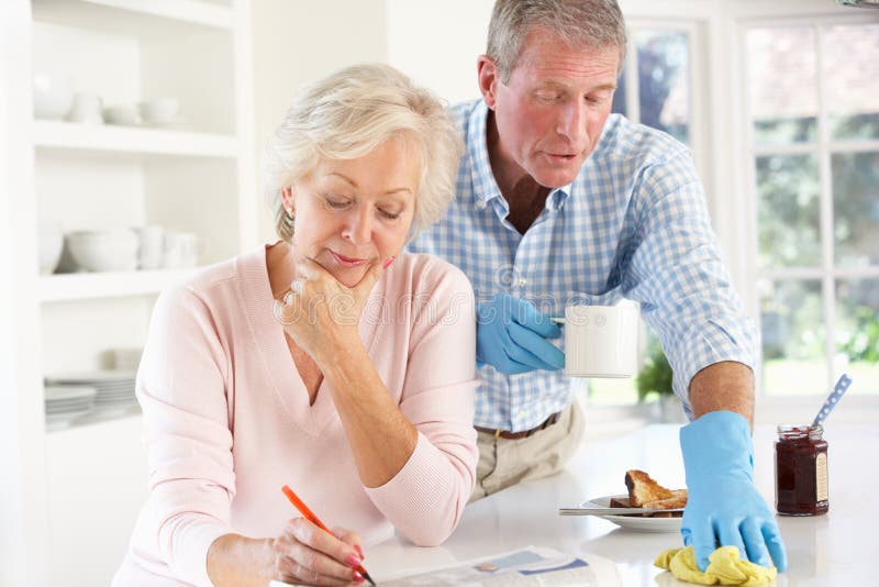 Retired Man Clearing Up after Breakfast Stock Photo - Image of indoors ...