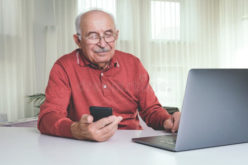 Retired Man Using Computer Technologies at Home Stock Image - Image of ...