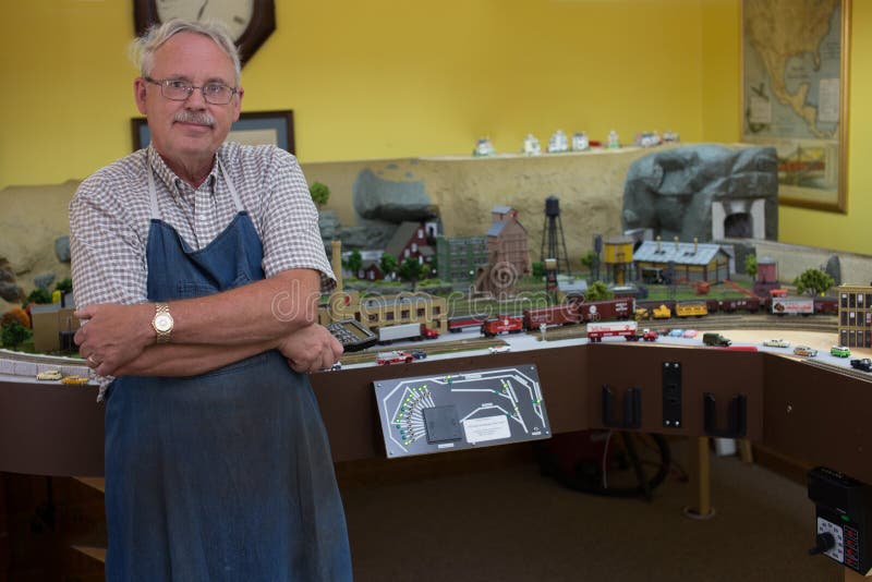 Retired man in workshop stock photo. Image of antique - 56180240
