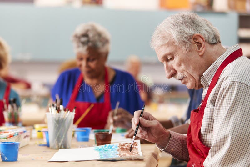 Retired Senior Man Attending Art Class in Community Centre Stock Photo ...