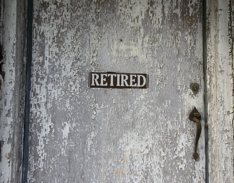 Retired Sign on Old Door stock photo. Image of citizen - 34129092