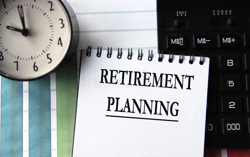 RETIREMENT PLANNING - Words in a White Notebook with an Alarm Clock and ...