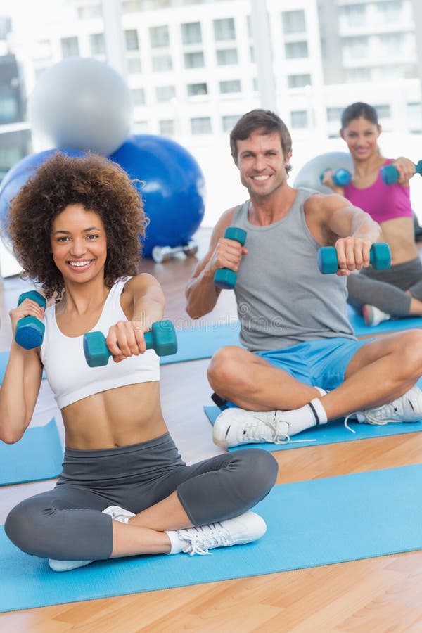 Retrato De Pesos De Levantamento De Um Peso Da Classe Do Ajuste Foto de ...