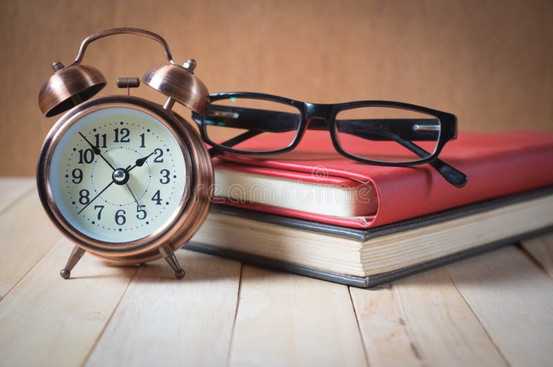 Retro Alarm Clock and Book. Stock Photo - Image of morning, glasses ...