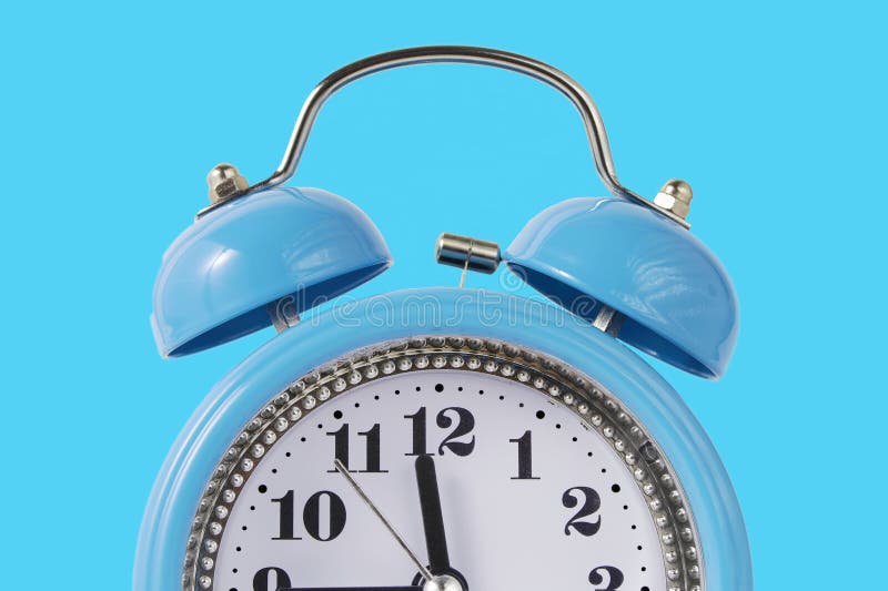 Retro Alarm Clock. Close Up One Classic Alarm Clock on a Blue ...