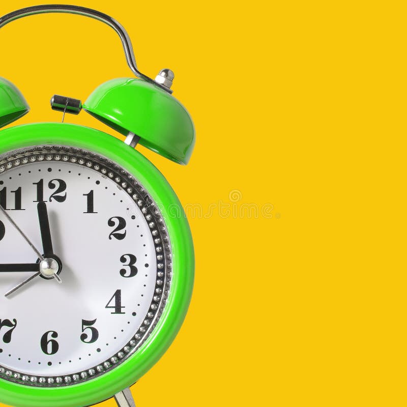 Retro Alarm Clock. Close Up One Classic Alarm Clock on a Yellow ...