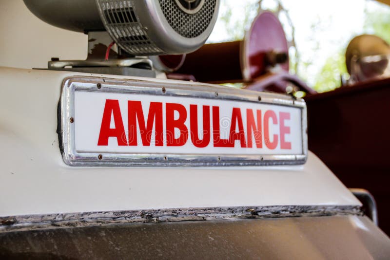 Photograph of Ambulance Car Sign and Text on White. the Emergency ...
