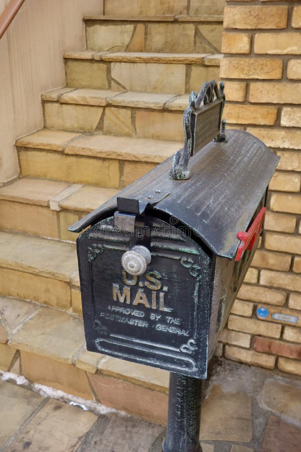 A Metal Mailbox with the Emblem of the Jerusalem Post Hangs on a Stone ...