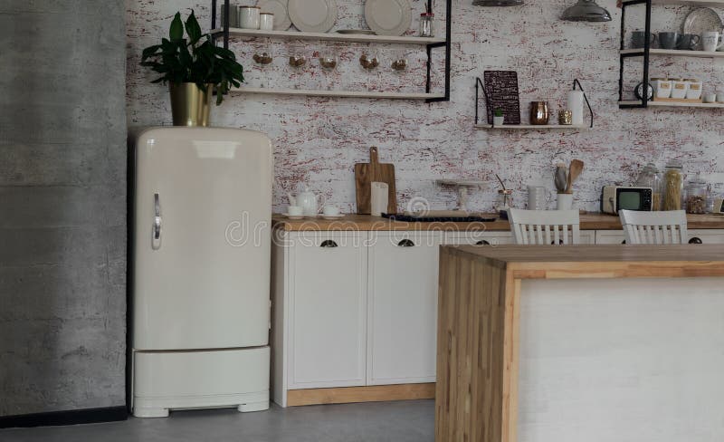 Retro Beige Color Fridge in Loft Kitchen with Bricks Wall Stock Image ...