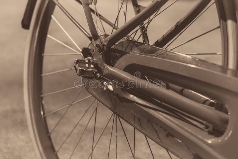 Retro Bicycle Wheel and Gears in Sepia Stock Image - Image of chain ...