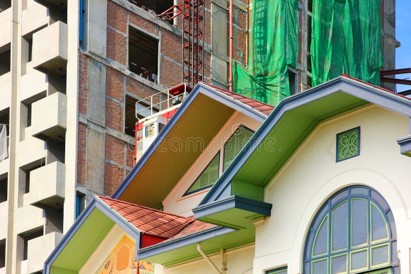 Retro Building Exterior Design with High Building in Construction Stock ...