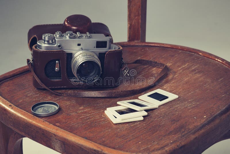 Retro Camera and Old Slides Lay on a Chair Stock Image - Image of copy ...
