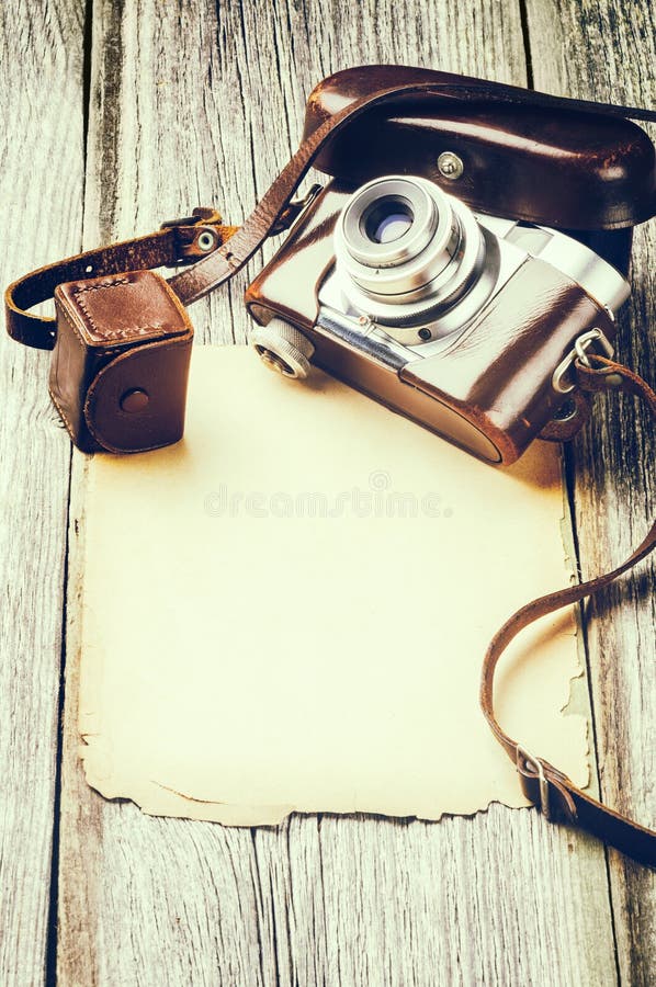 Retro Camera on Old Wood Background Stock Photo - Image of photographer ...