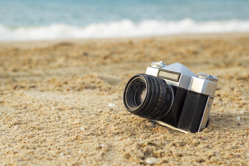 Retro Camera in the Sand on a Beach Stock Image - Image of hobby, retro ...