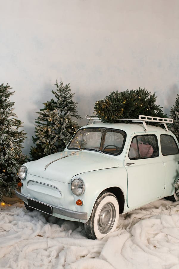 Retro Car with a Christmas Tree on Top of it Stock Photo - Image of ...