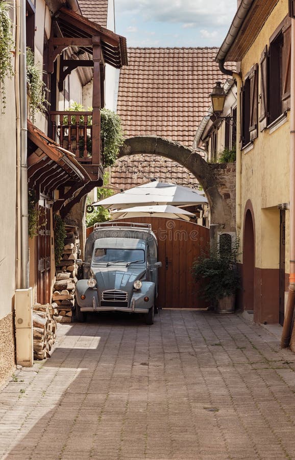 Retro Car in the Courtyard of the French City Editorial Photography ...
