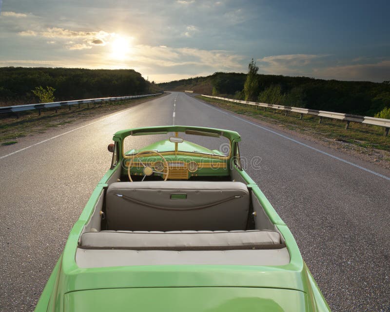 Retro car on real road stock image. Image of road, design - 257542477