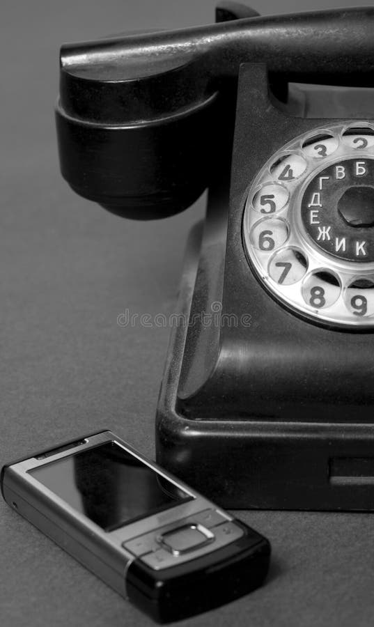 Retro Classics and Modern Phones Stock Image - Image of cord, aged ...
