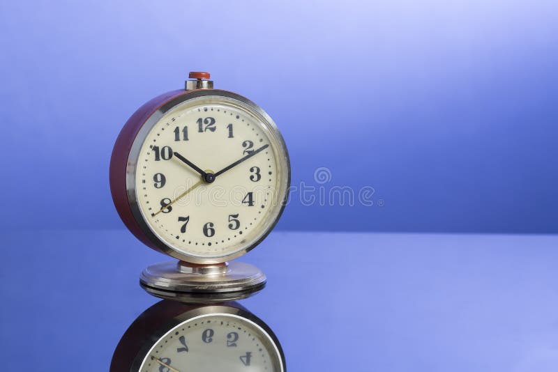 Retro Clock on Nice Blue Background with Reflection Stock Image - Image ...