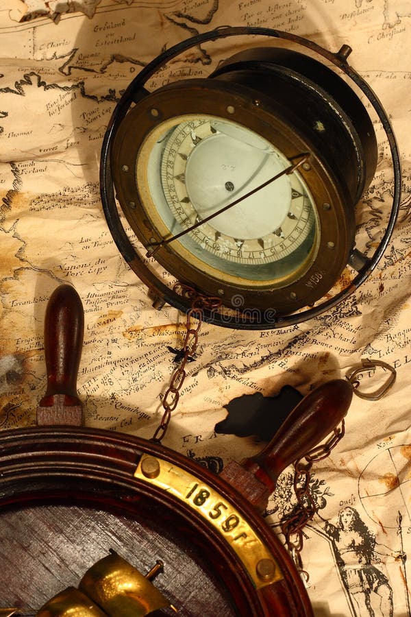 Nautical compass and wheel stock image. Image of journey - 6321071