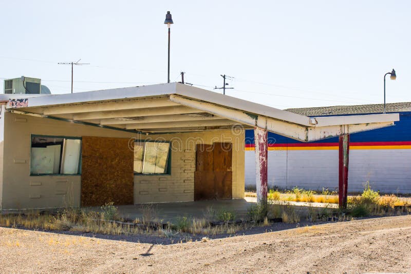 Retro Drive Thru Building with Boarded Up Doorway Stock Photo - Image ...