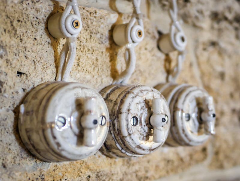 Retro Electrical Wiring with Wires and Switches on an Old Stone Stock ...