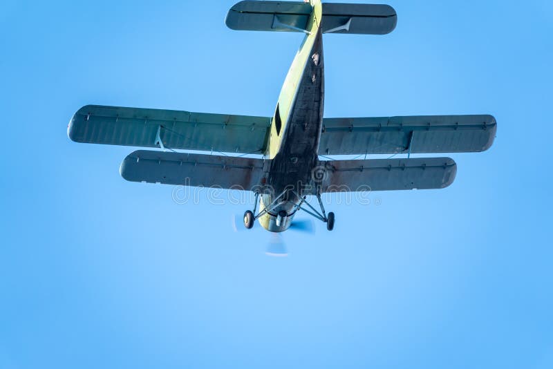 Retro Green Biplane Plane in the Blue Sky Stock Image - Image of ...