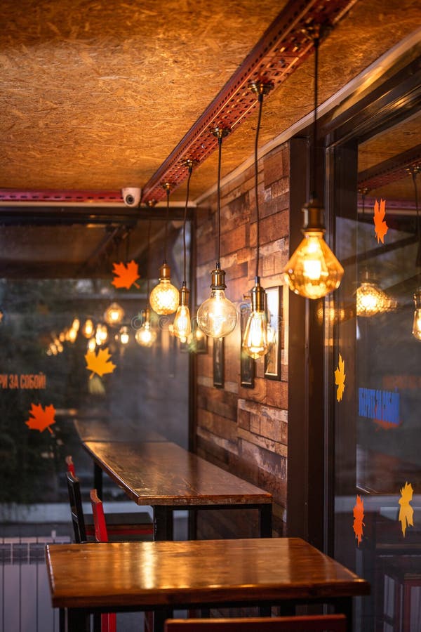 Retro Light Bulbs with Warm Light in the Interior of the Cafe Stock ...