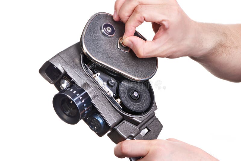 Retro Mechanical Movie Camera and Film Strip in Hands Operator Stock ...
