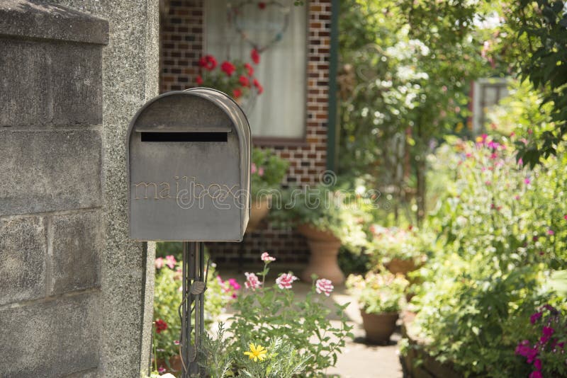 Retro Metal Mail Box in Front of a House Stock Photo - Image of ...