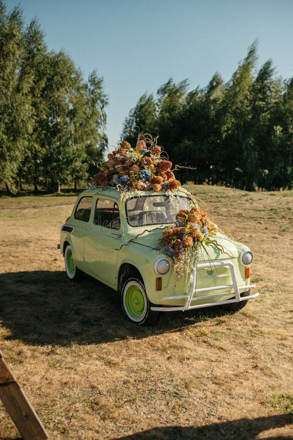 Retro Mint Colored Car Decorated with Autumn Flowers Stock Photo ...