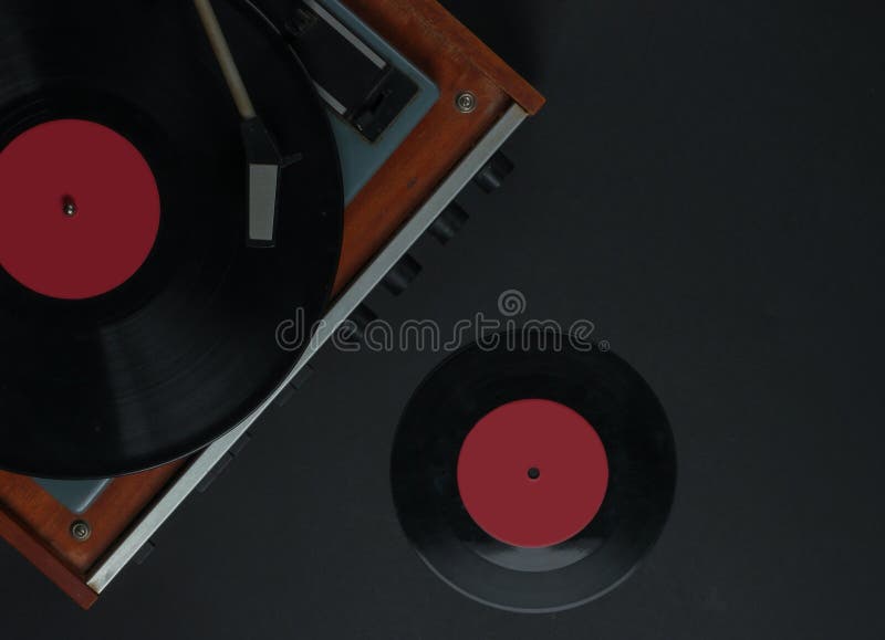 Retro Music Player. Vinyl Record Player with a Vinyl Record on a Black ...