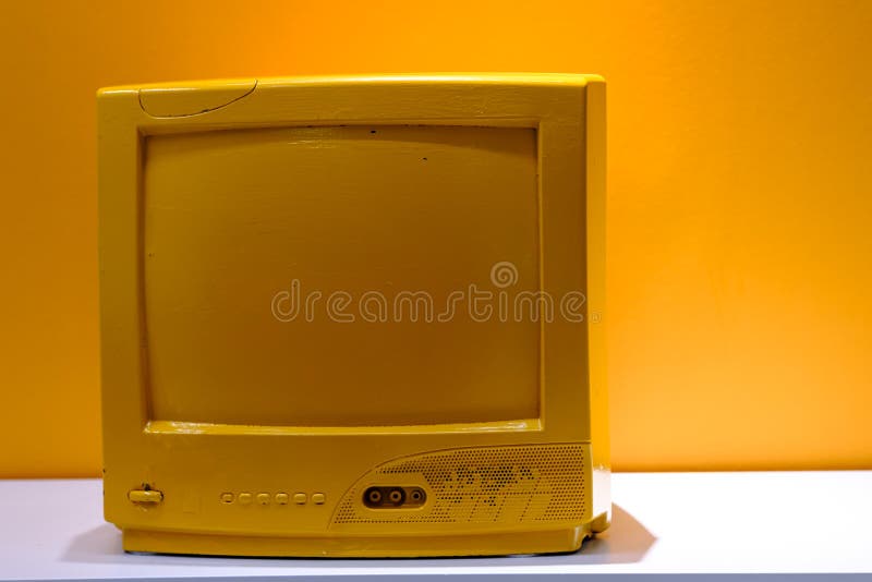 Retro Old Yellow TV Display on Table on Table Stock Image - Image of ...