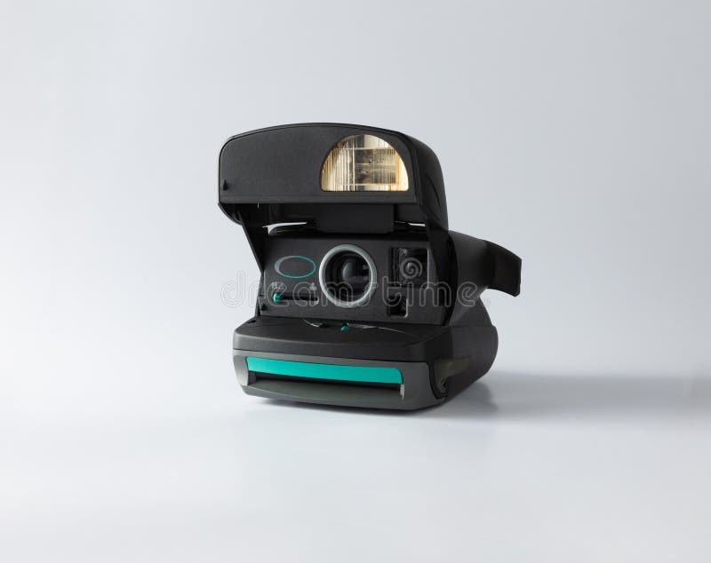 Retro Polaroid Instant Camera with Pop-up Flash on a White Background ...