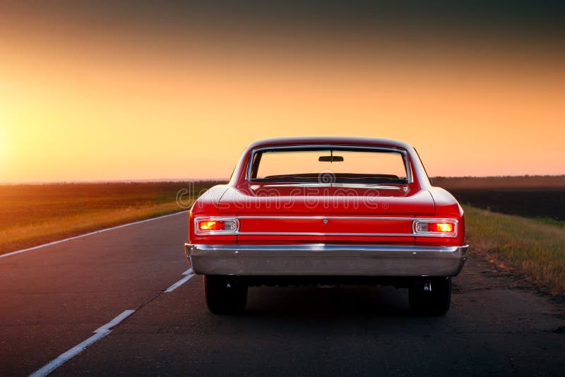 Retro Red Car Standing on Asphalt Road at Sunset Stock Image - Image of ...