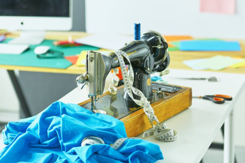 Retro Sewing Machine on Designer Clothes Desktop Stock Photo - Image of ...
