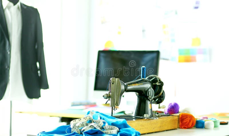 Retro Sewing Machine on Designer Clothes Desktop Stock Image - Image of ...