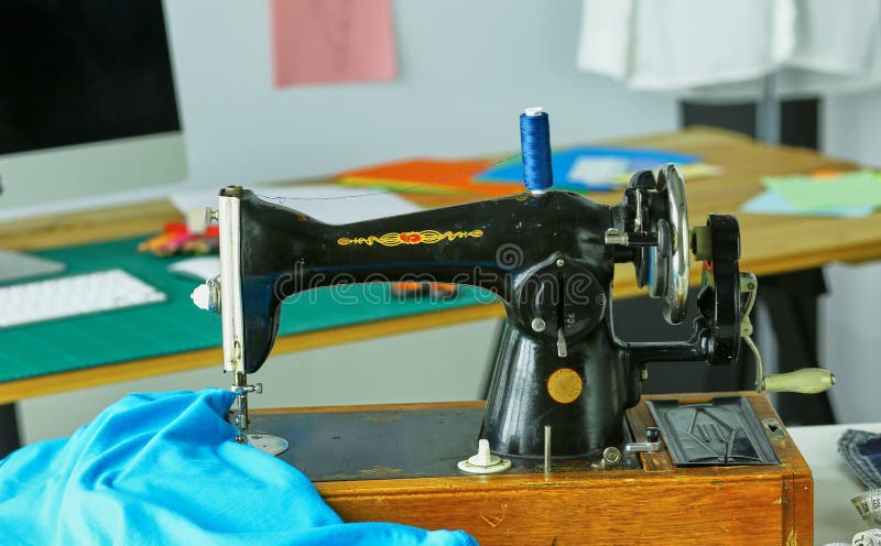 Retro Sewing Machine on Designer Clothes Desktop Stock Photo - Image of ...