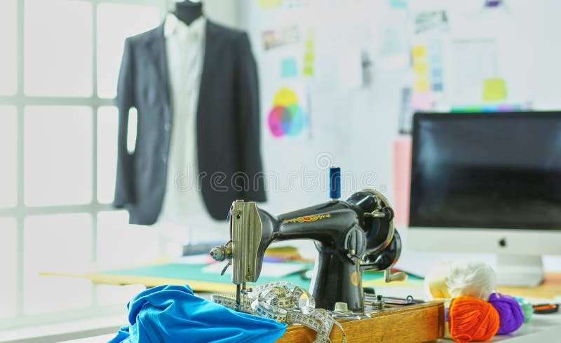 Retro Sewing Machine on Designer Clothes Desktop Stock Image - Image of ...