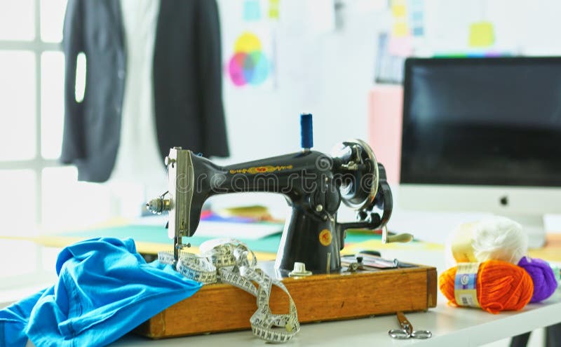 Retro Sewing Machine on Designer Clothes Desktop Stock Photo - Image of ...