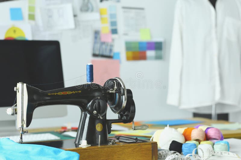 Retro Sewing Machine on Designer Clothes Desktop Stock Photo - Image of ...