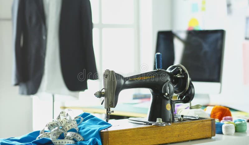 Retro Sewing Machine on Designer Clothes Desktop Stock Photo - Image of ...