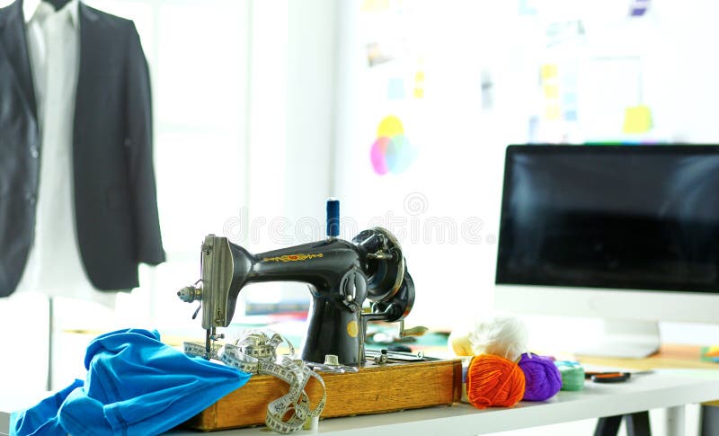 Retro Sewing Machine on Designer Clothes Desktop Stock Photo - Image of ...